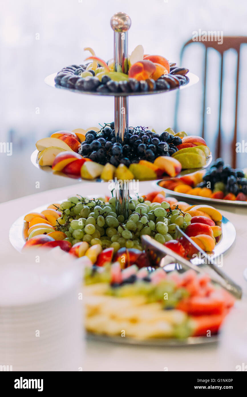 Set of beautifully decorated fruits on corporate party event or wedding ...
