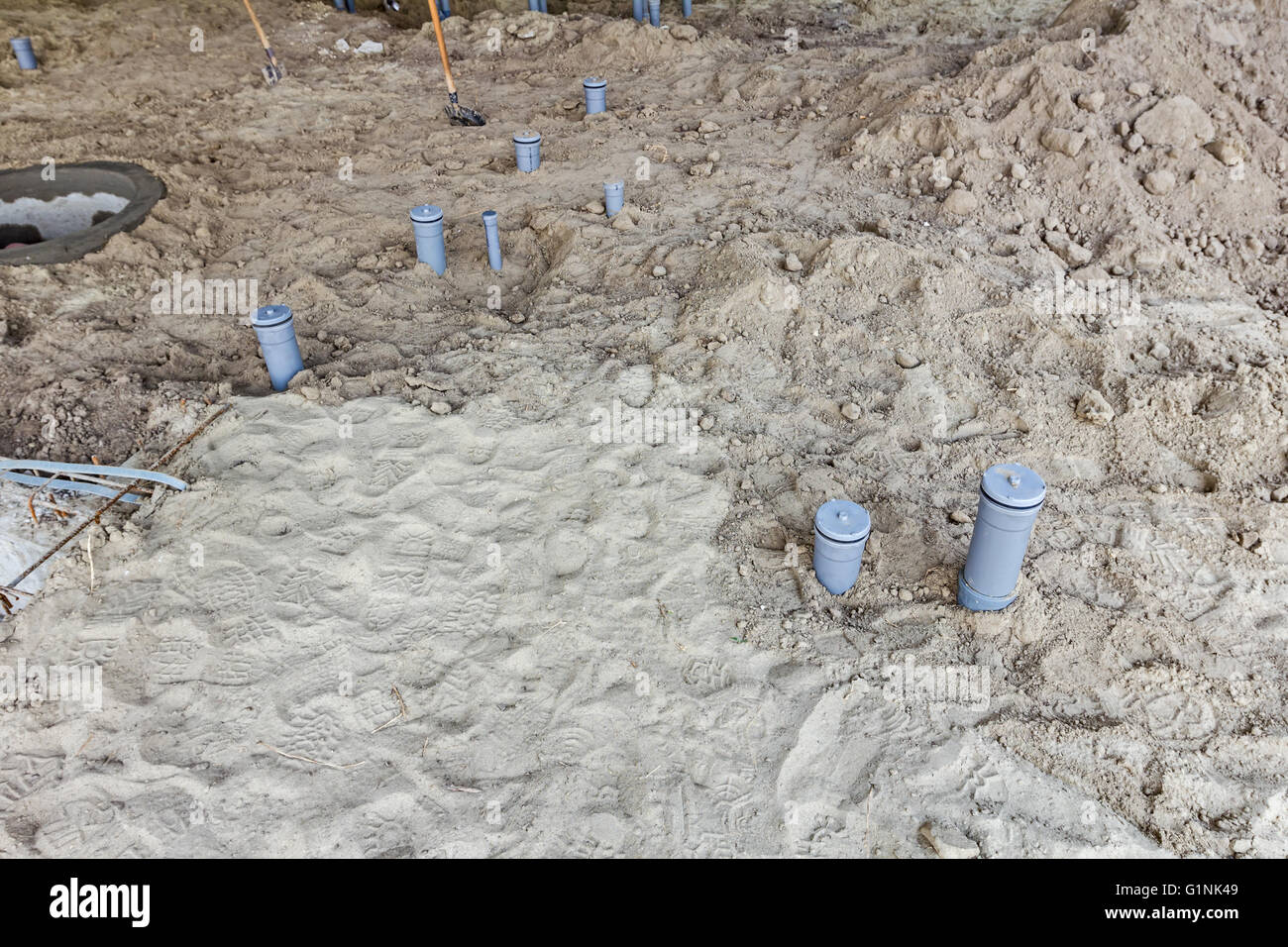 Set of waste pipes are assembled and lined up on building site Stock ...