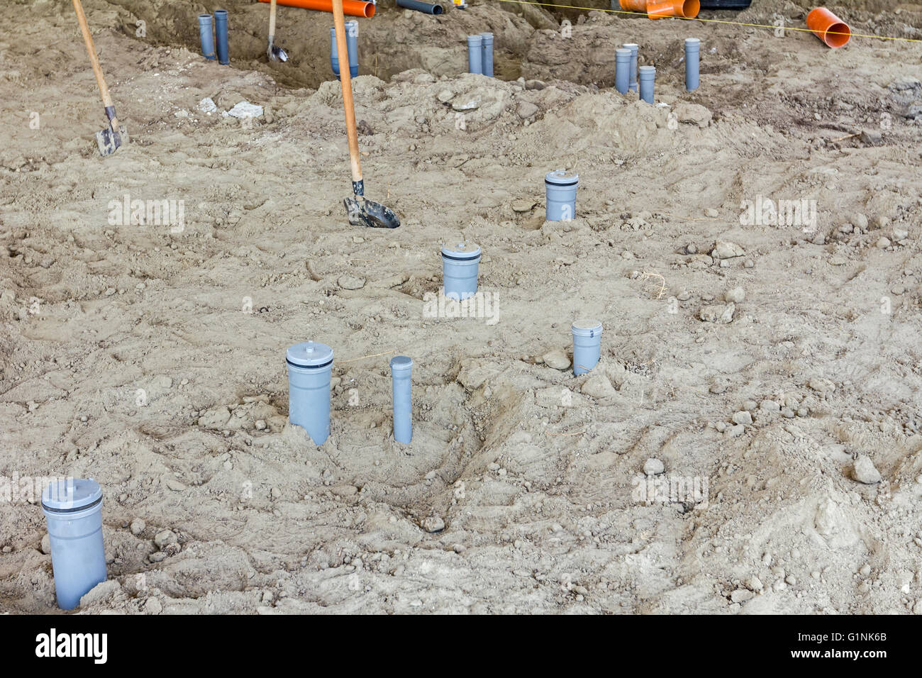 Set of waste pipes are assembled and lined up on building site Stock ...