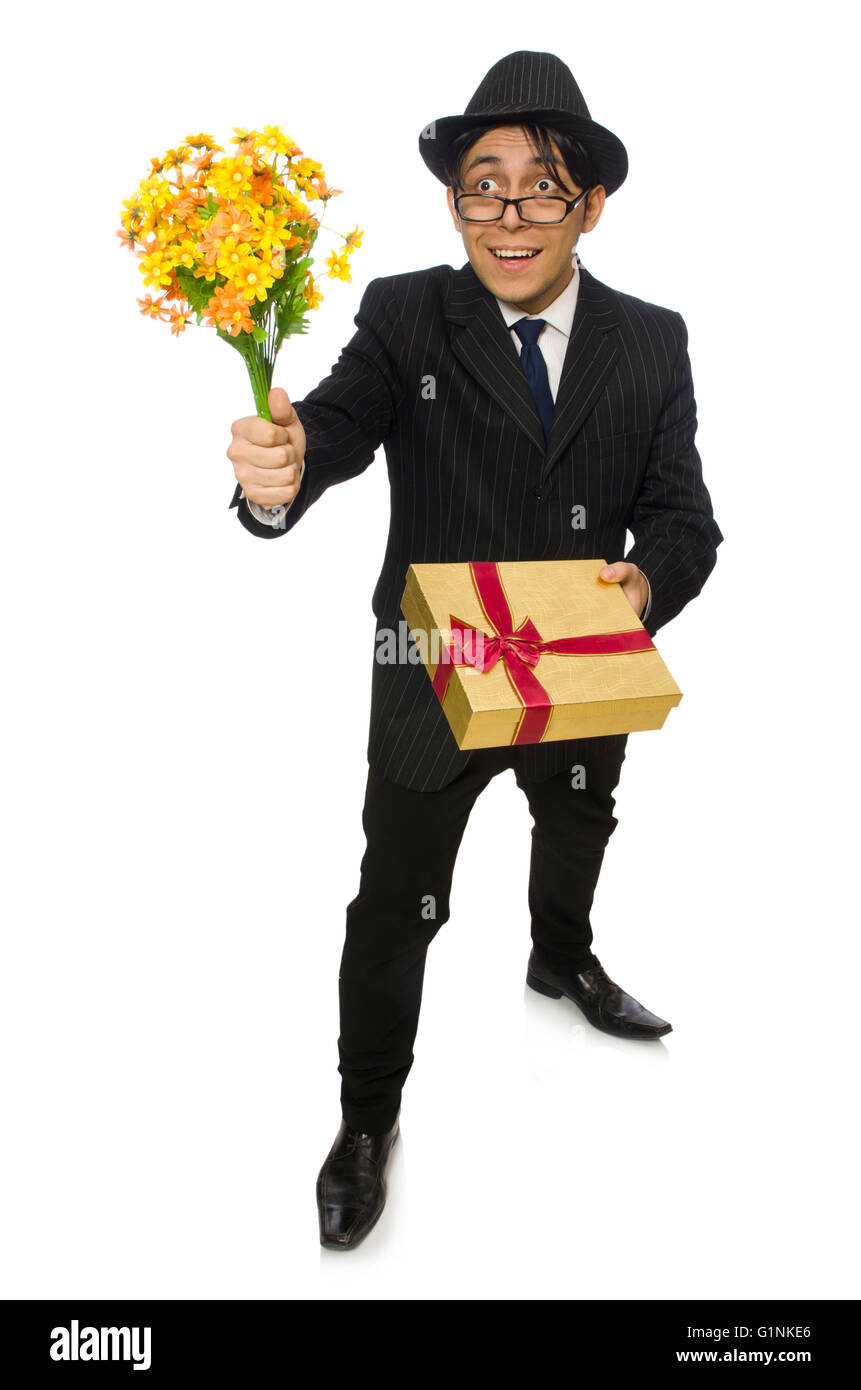 Funny man with flowers and giftbox Stock Photo - Alamy