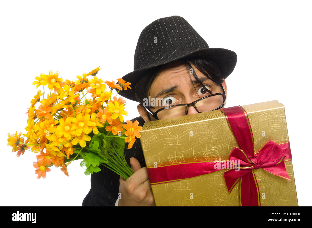 Funny man with flowers and giftbox Stock Photo - Alamy