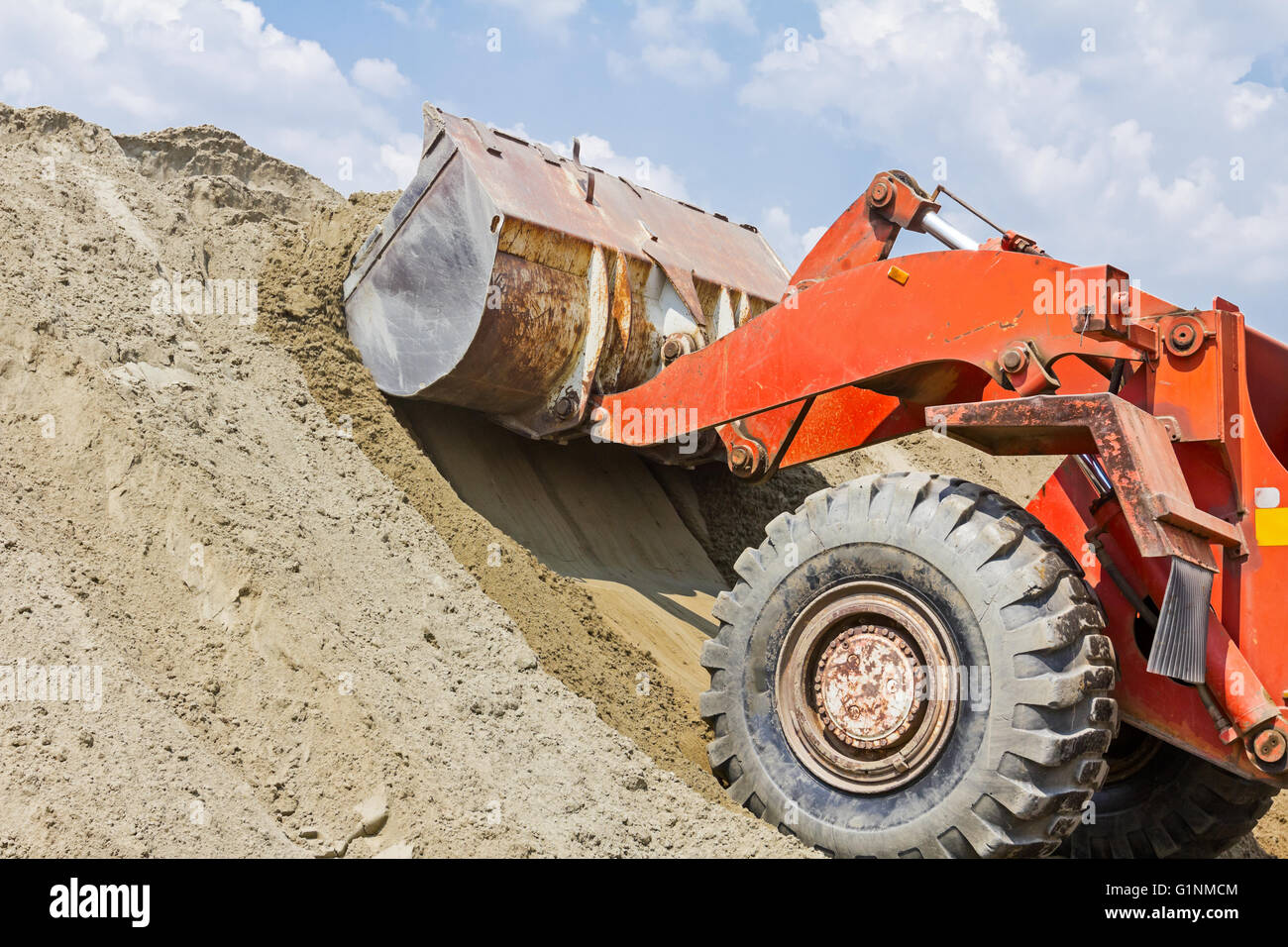Machine pushing earth hi-res stock photography and images - Alamy