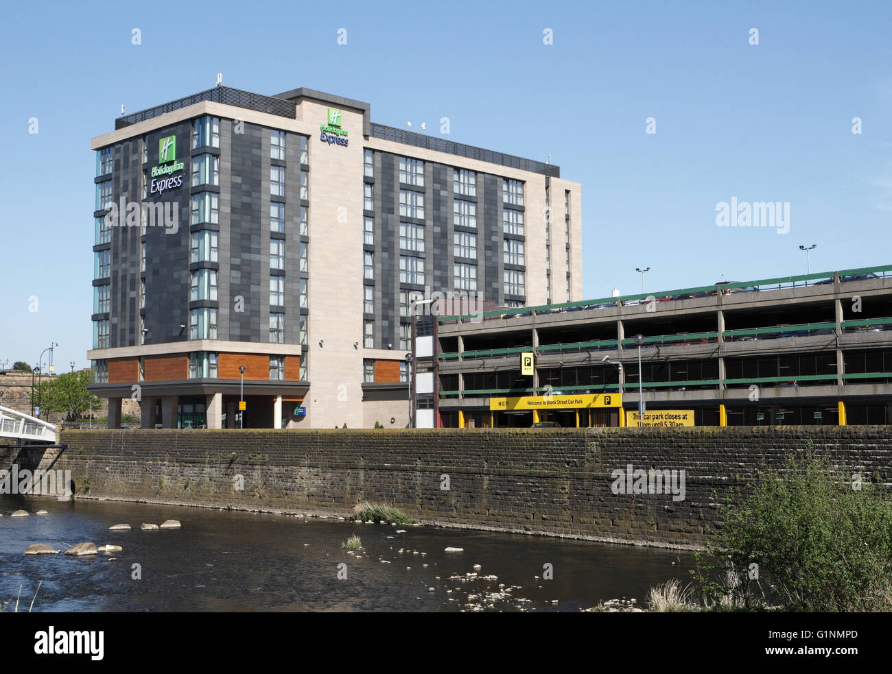 Holiday Inn Express hotel building and River Don in Sheffield England ...