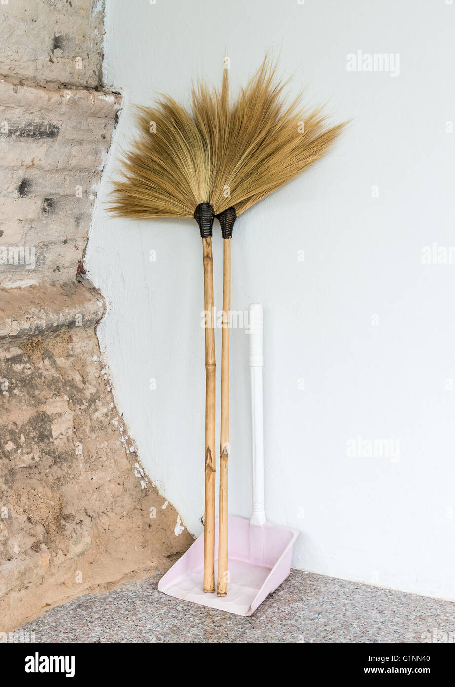 Double broom with dustpan for cleaning the house Stock Photo - Alamy