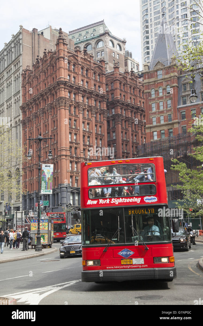 Double decker tour bus in lower Manhattan on its way to Brooklyn over ...