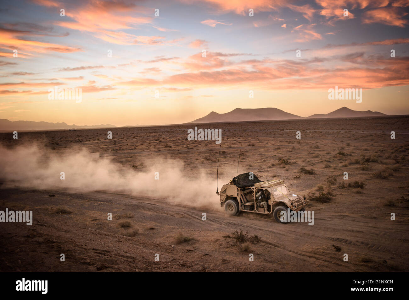 Fort Irwin, California, USA. 6th Aug, 2015. Soldiers ride a lightweight ...