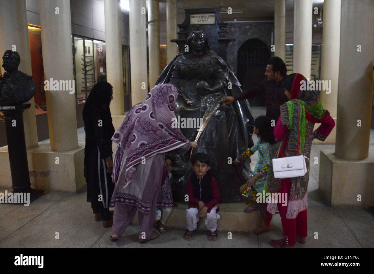 Pakistani visitors look different stuff of collection on display at the ...