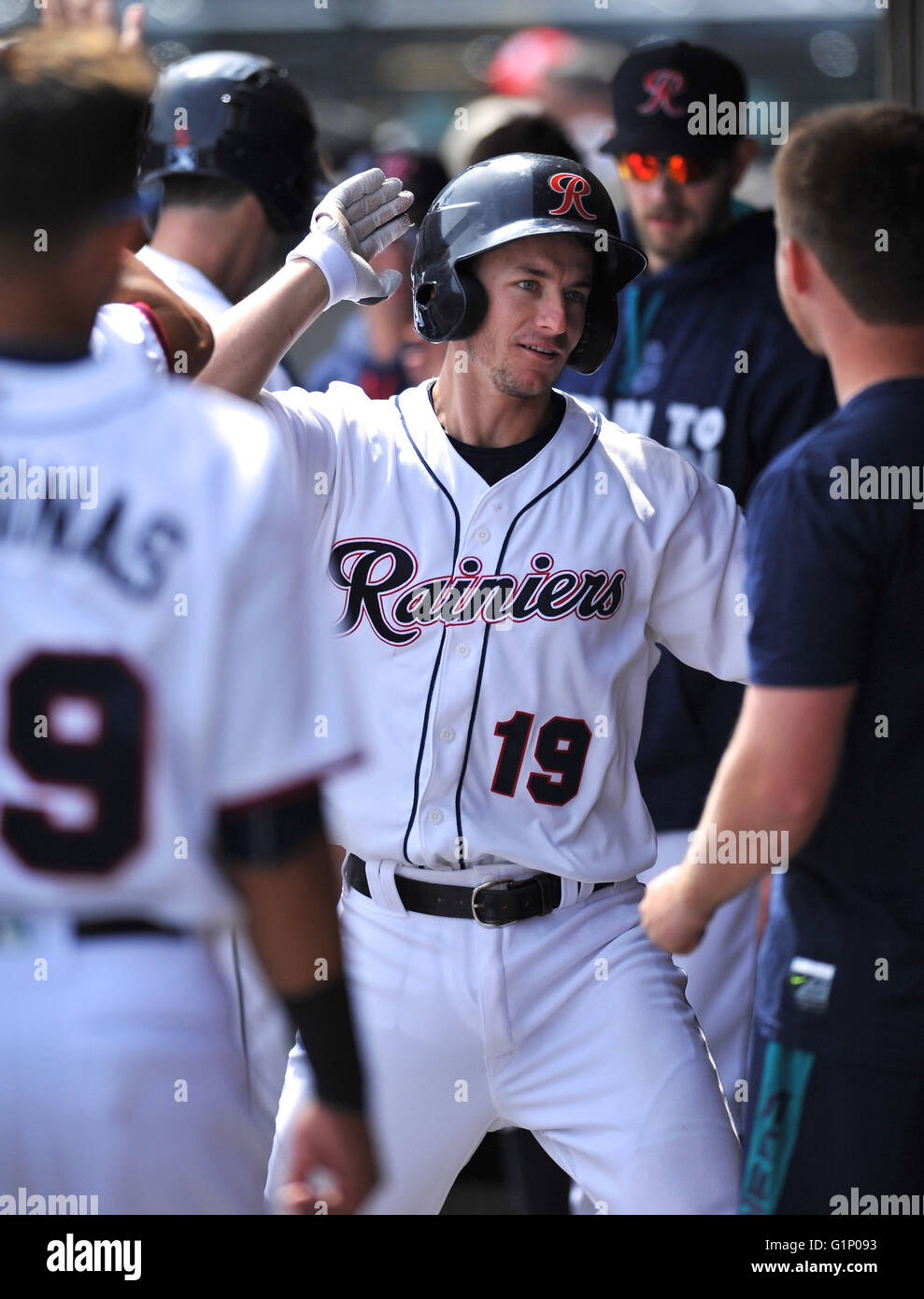 Tacoma Rainiers catcher Rob Brantly (19) gets congratulations in the ...