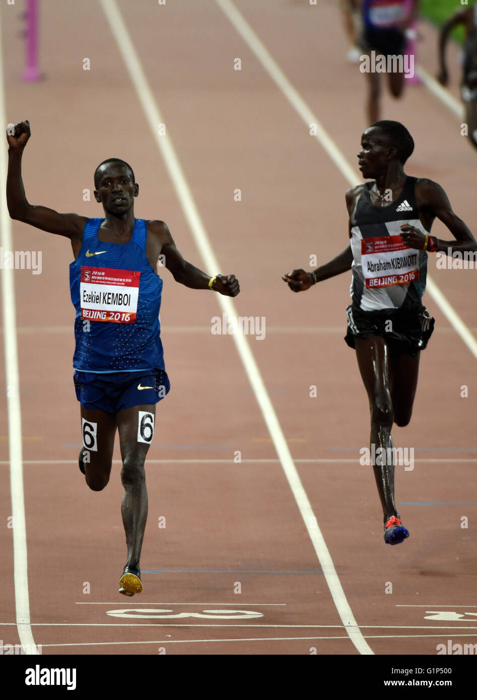 Beijing, China. 18th May, 2016. Ezekiel Kemboi (L) of Kenya celebrates ...
