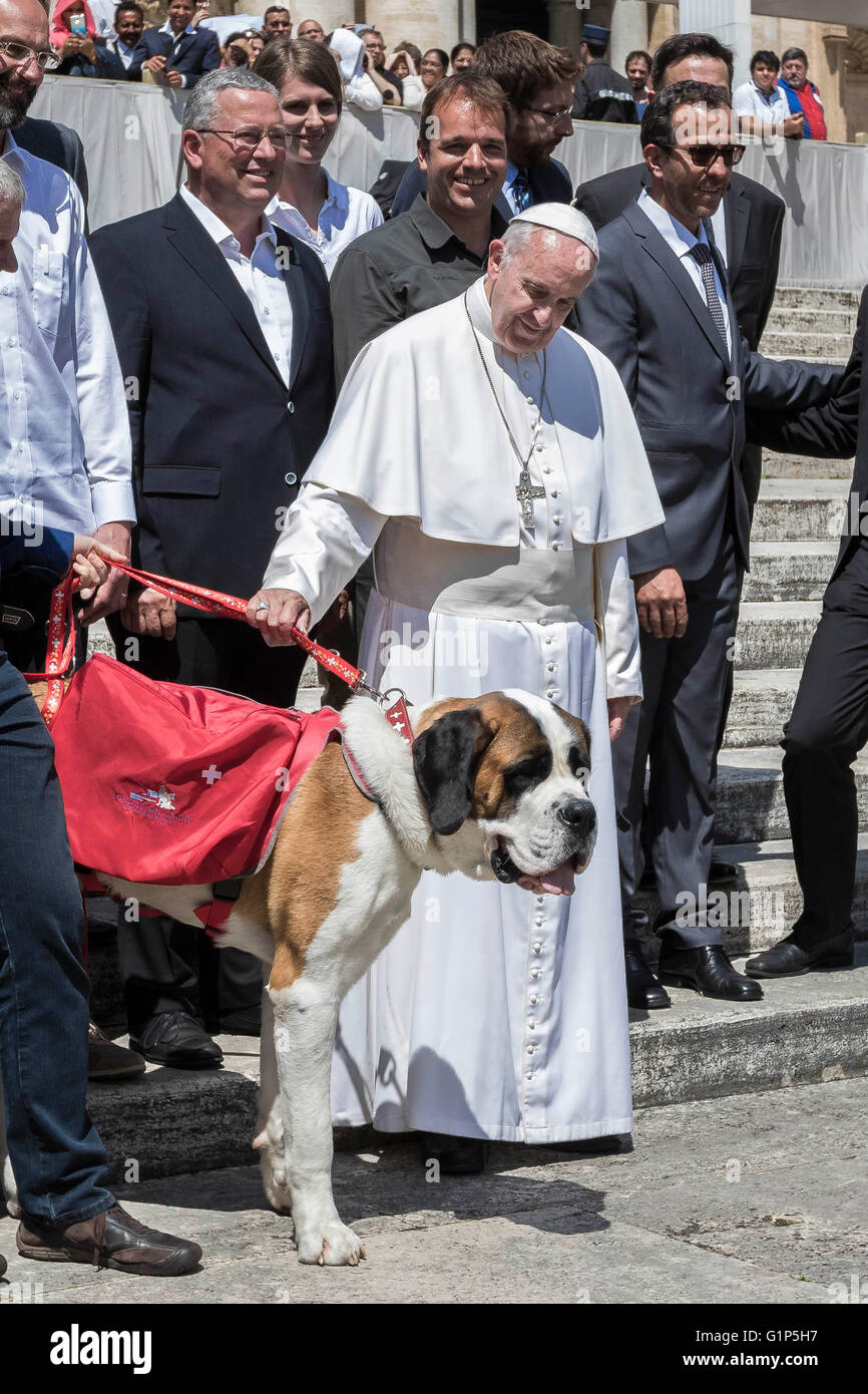 Vatican City, Vatican. 18th May, 2016. Pope Francis poses with a dog of ...