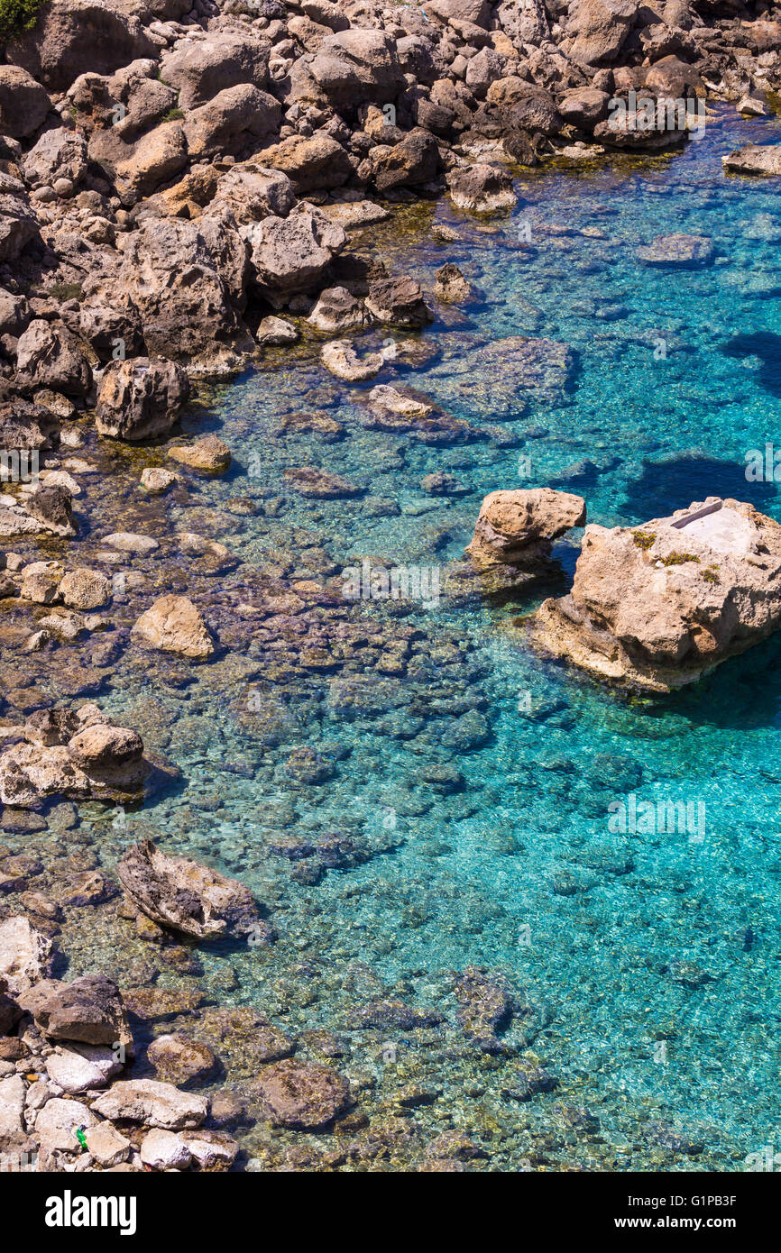 Beautiful Deep blue sea and rocks in Greece Stock Photo - Alamy