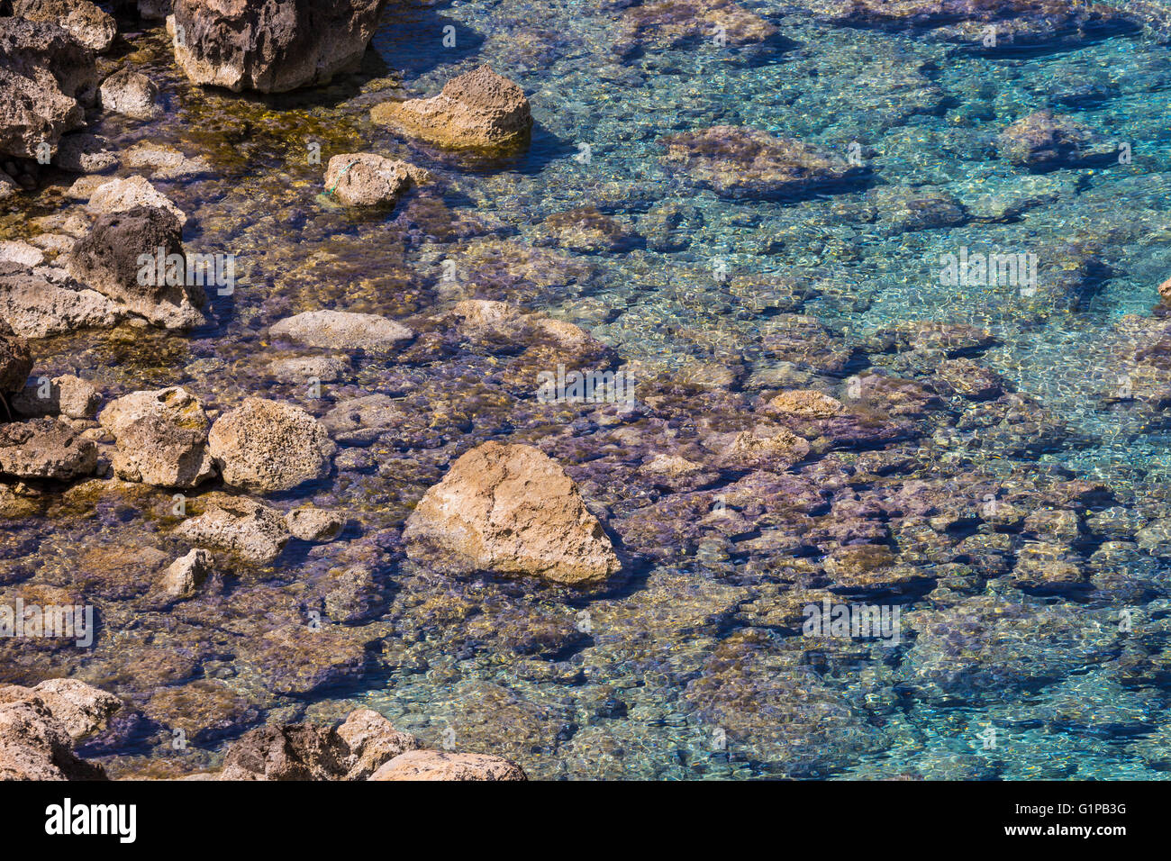 Beautiful Deep blue sea and rocks in Greece Stock Photo - Alamy