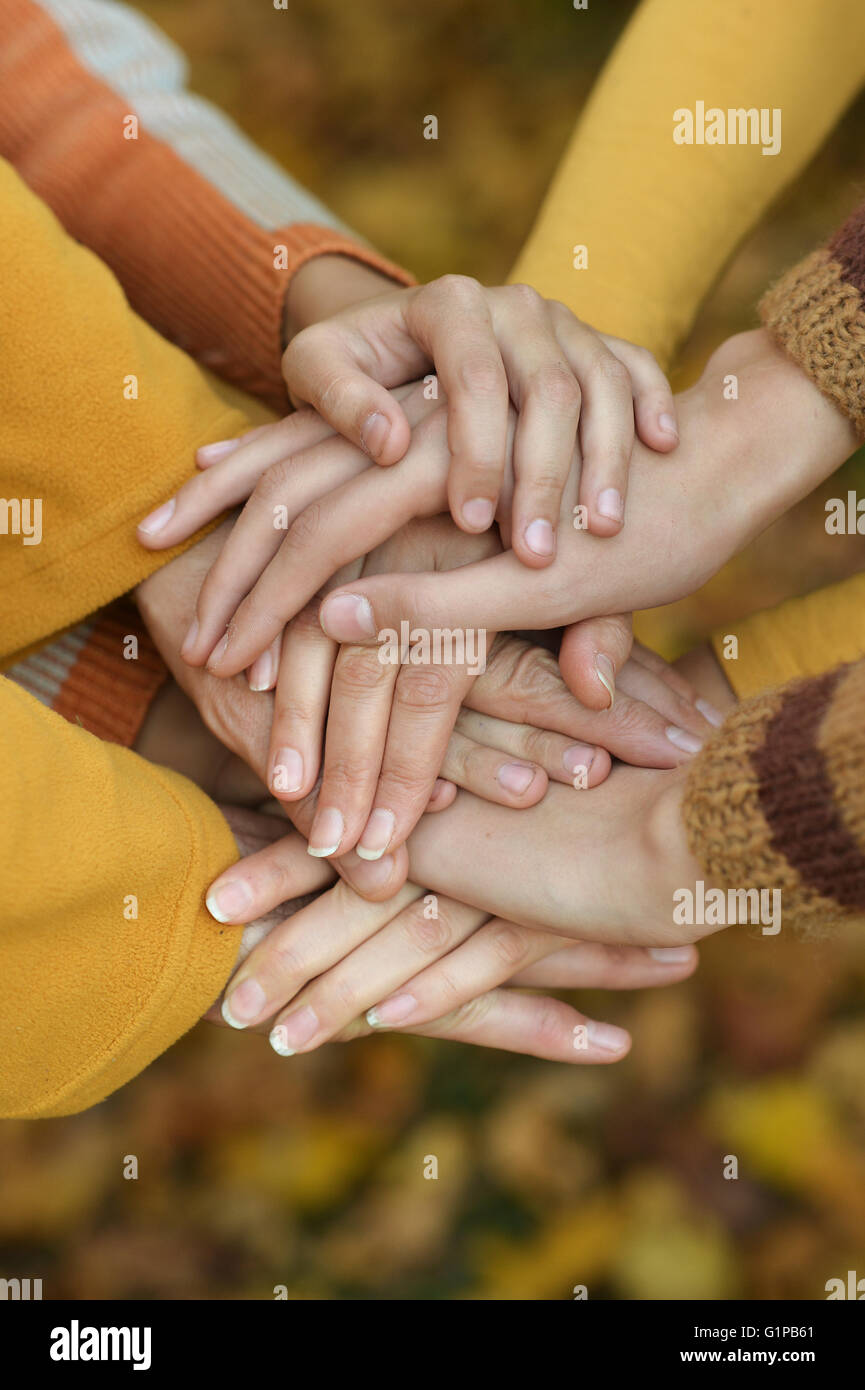 Hands held together Stock Photo - Alamy