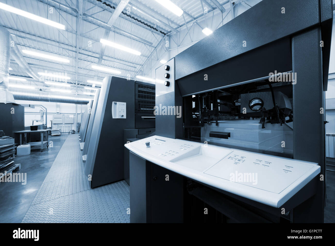 The equipment for printing in a modern printing house Stock Photo - Alamy