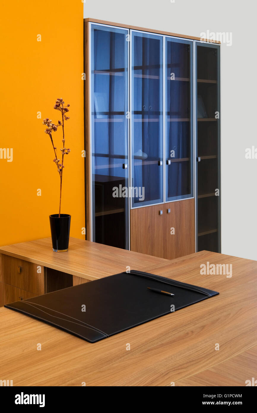 large wooden desk in a modern office Stock Photo - Alamy