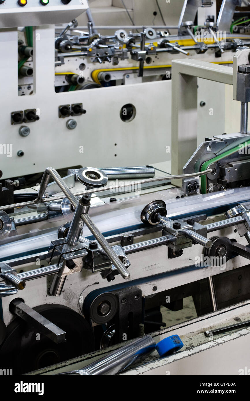 Folding machines hi-res stock photography and images - Alamy