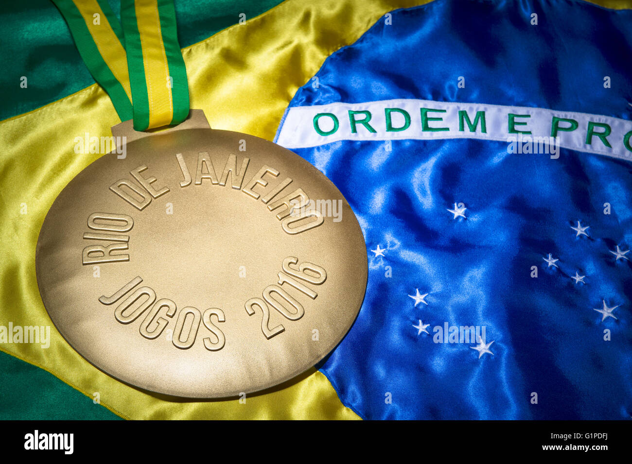 RIO DE JANEIRO - FEBRUARY 3, 2016: Large gold medal commemorating the ...