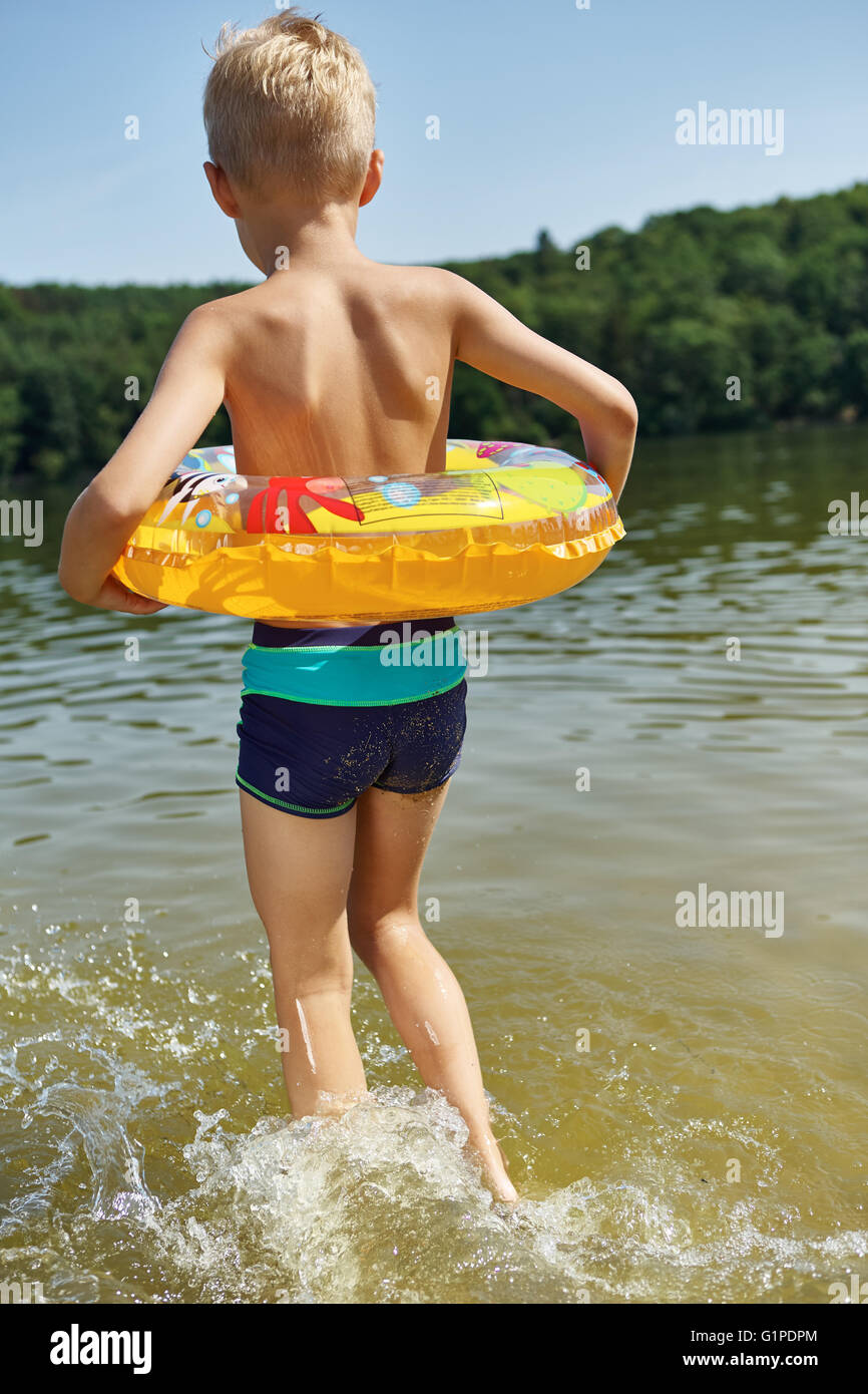 Child floating on back hi-res stock photography and images - Alamy
