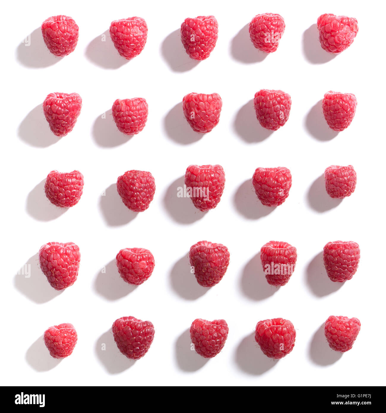 Square pattern of red raspberries, overhead from above, isolated on ...
