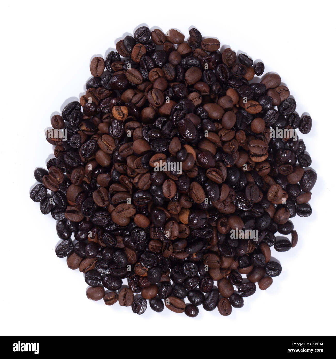 Dark roasted coffee beans, isolated on white background Stock Photo - Alamy