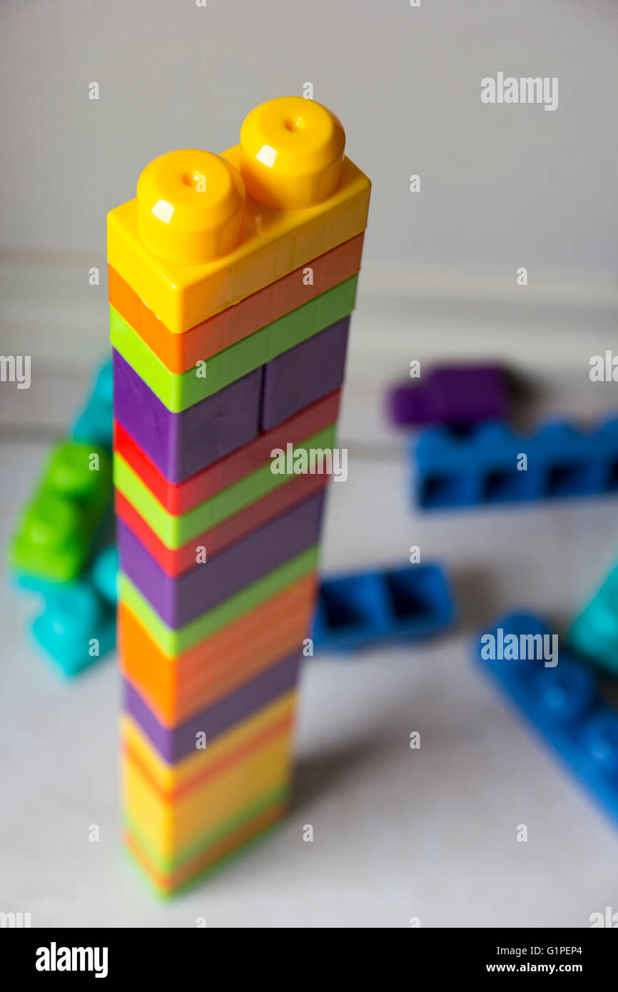 Colored tower, built with toy blocks Stock Photo - Alamy
