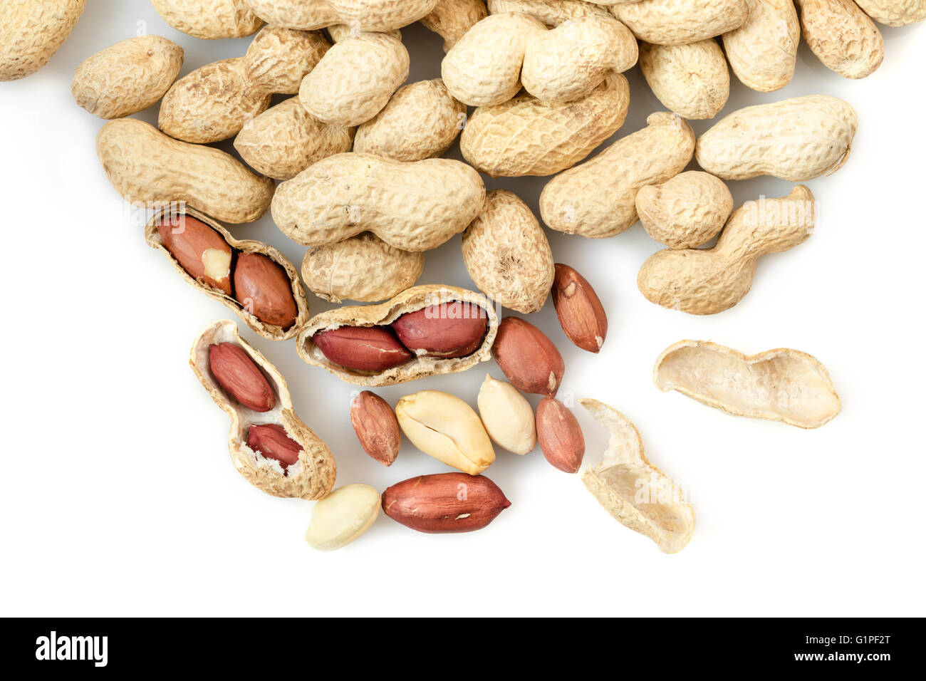 groundnut in the skin close-up on a white background Stock Photo - Alamy