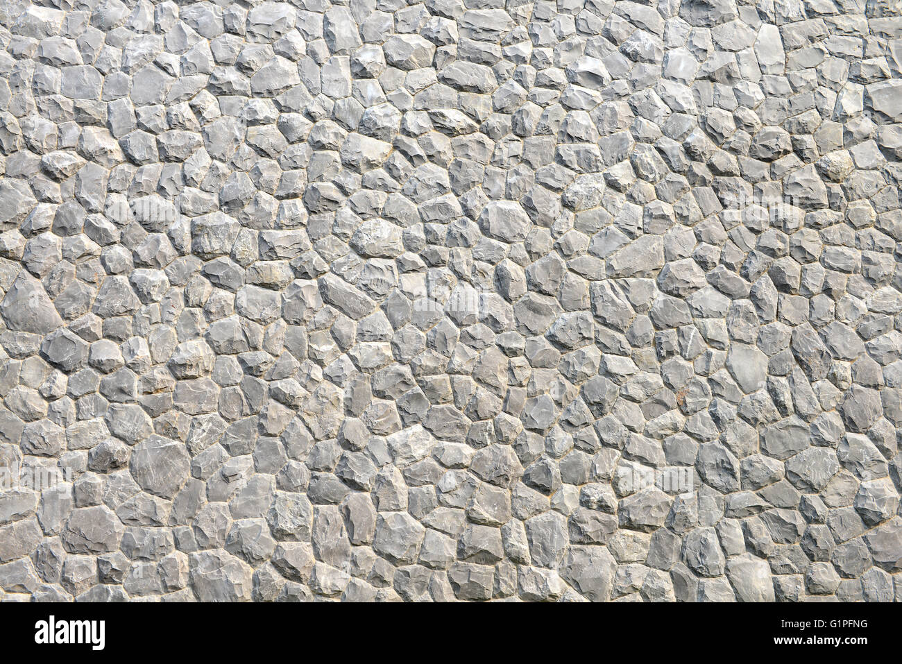 Gray stone wall texture and background Stock Photo - Alamy