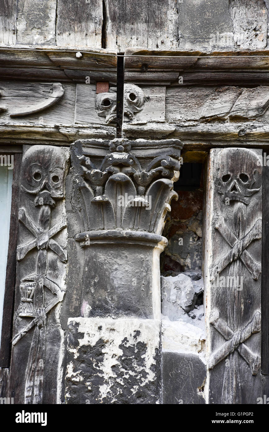 Skulls carved on facade of medieval courtyard Aitre Saint Maclou plague ...