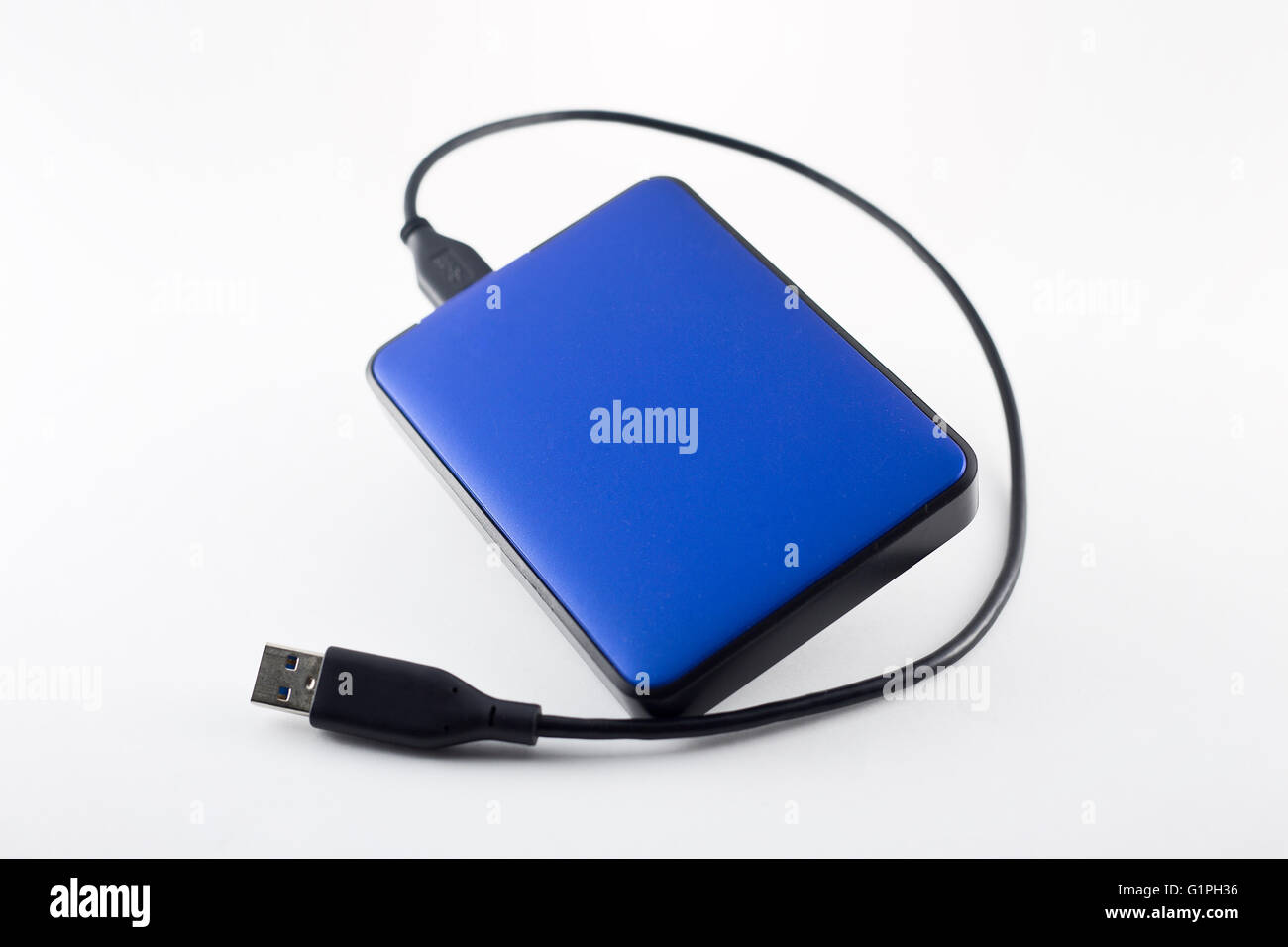 Portable Hard disk blue isolated on white background Stock Photo - Alamy