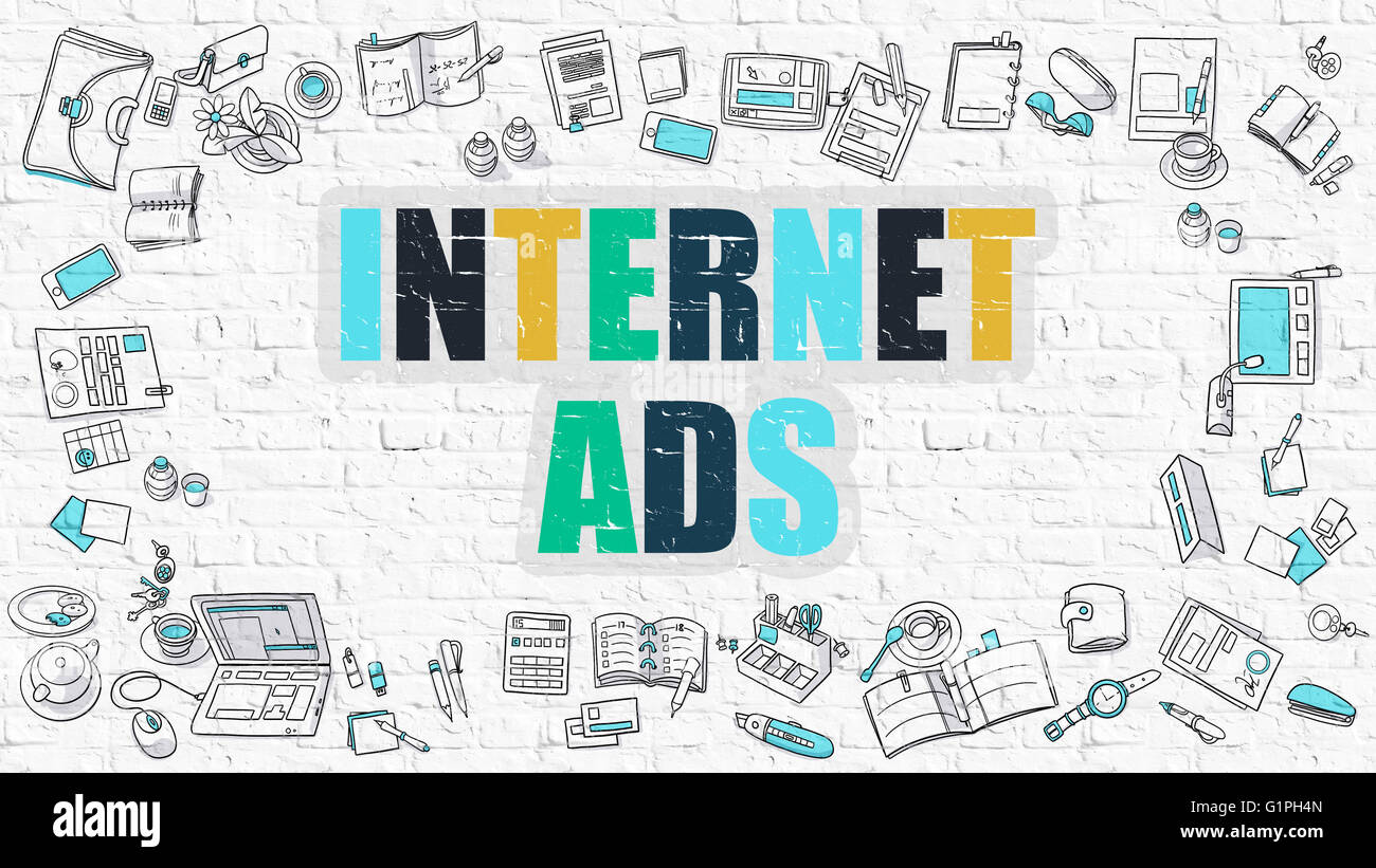 Internet Ads on White Brick Wall Stock Photo - Alamy