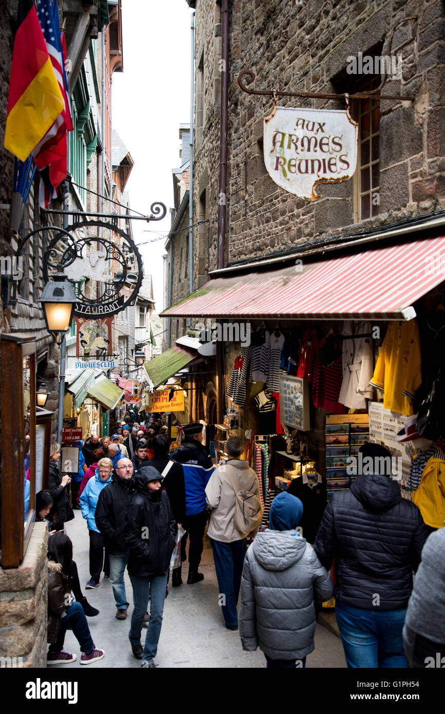 Crowds on main street Grande Rue in Mont Saint Michel St Michael's ...