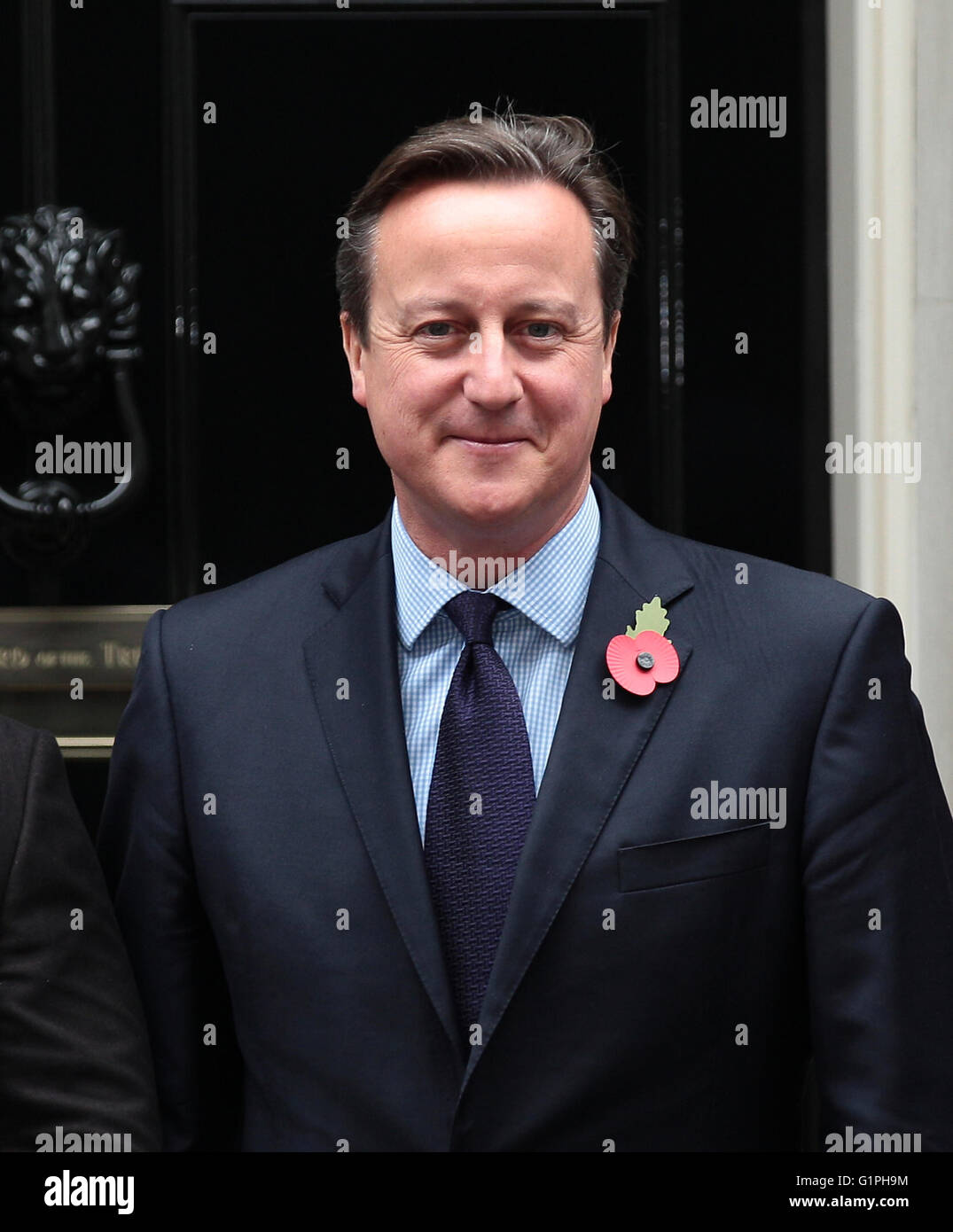 Prime Minister David Cameron buys his remembrance poppy from Corporal ...
