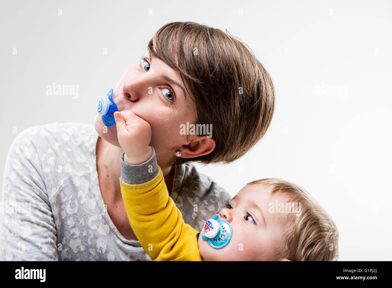 Two pacifiers hi-res stock photography and images - Alamy