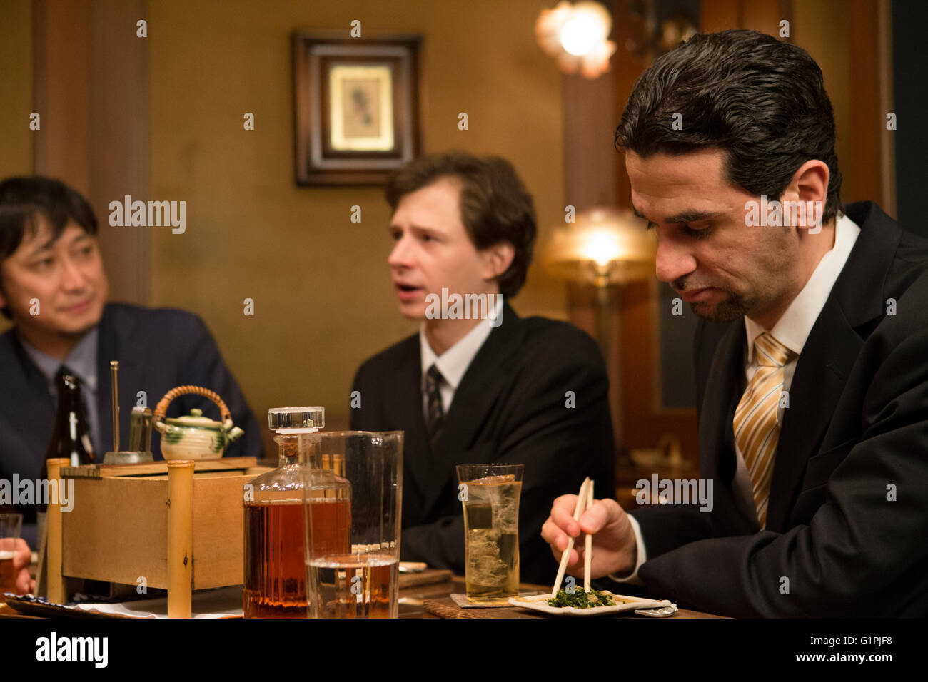 Businessmen at Japanese bar Stock Photo - Alamy