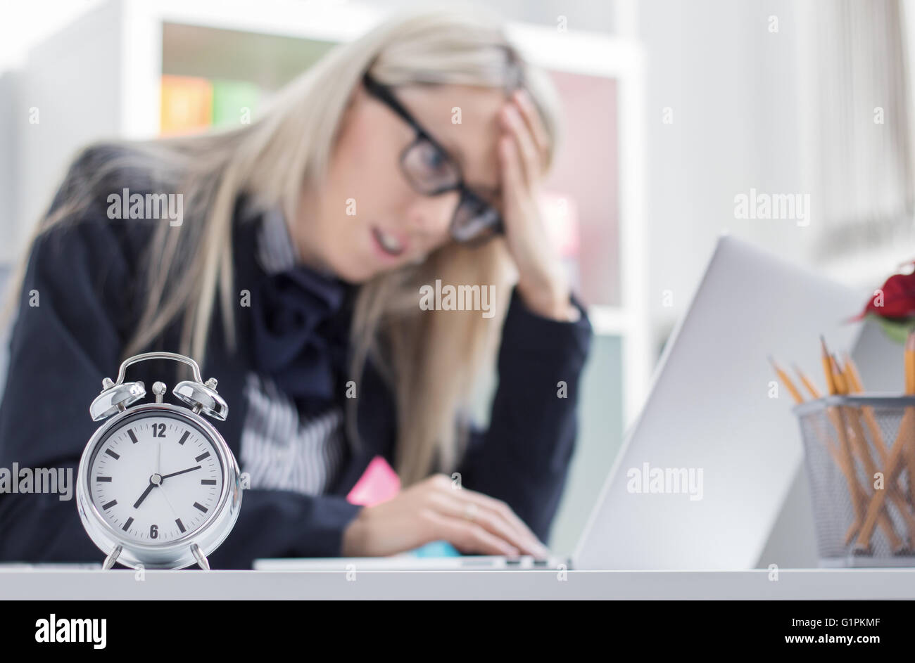 Stressful woman can't finish job on time Stock Photo - Alamy