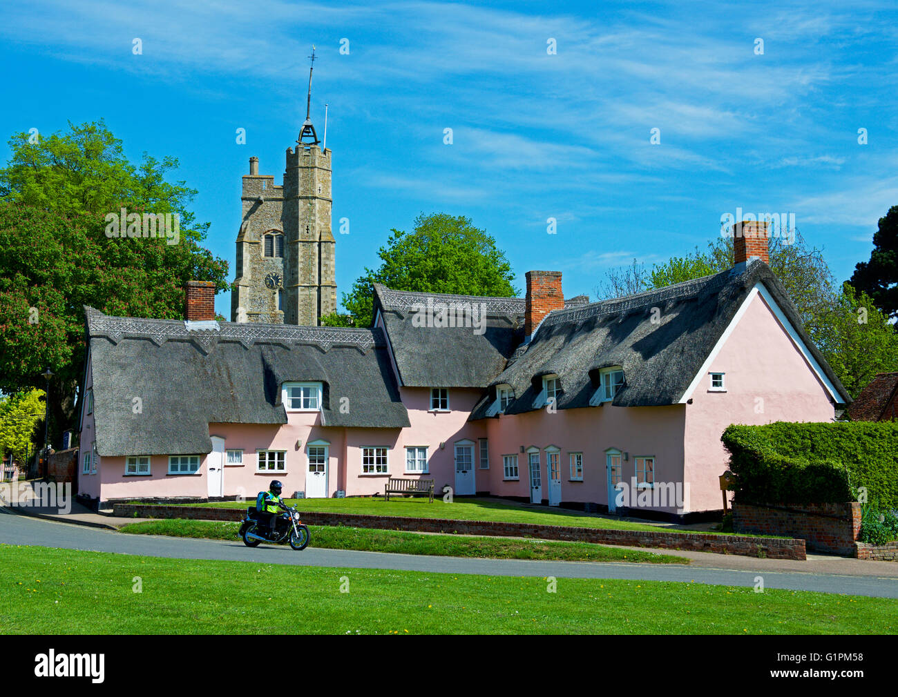 Almshouses and St Mary's church, in the village of Cavendish, Suffolk ...