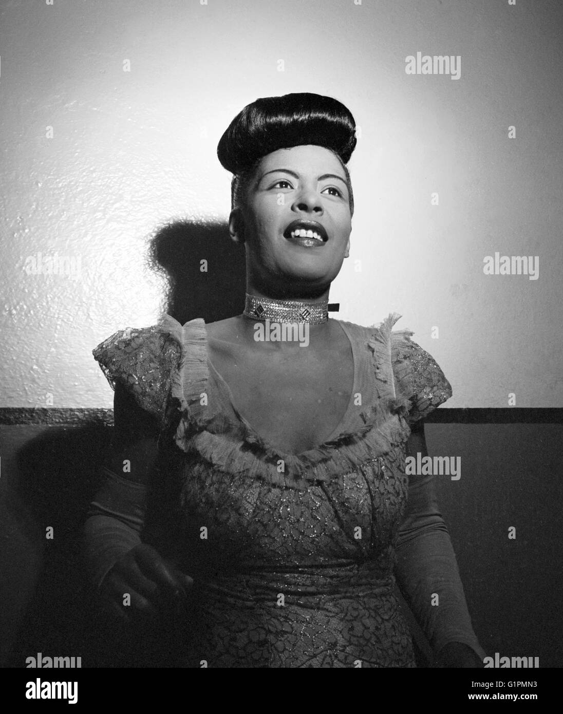 BILLIE HOLIDAY (1915-1959). American singer. Backstage at Carnegie Hall ...