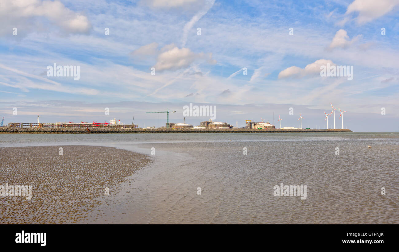 beach with port of Zeebrugge in background Stock Photo - Alamy