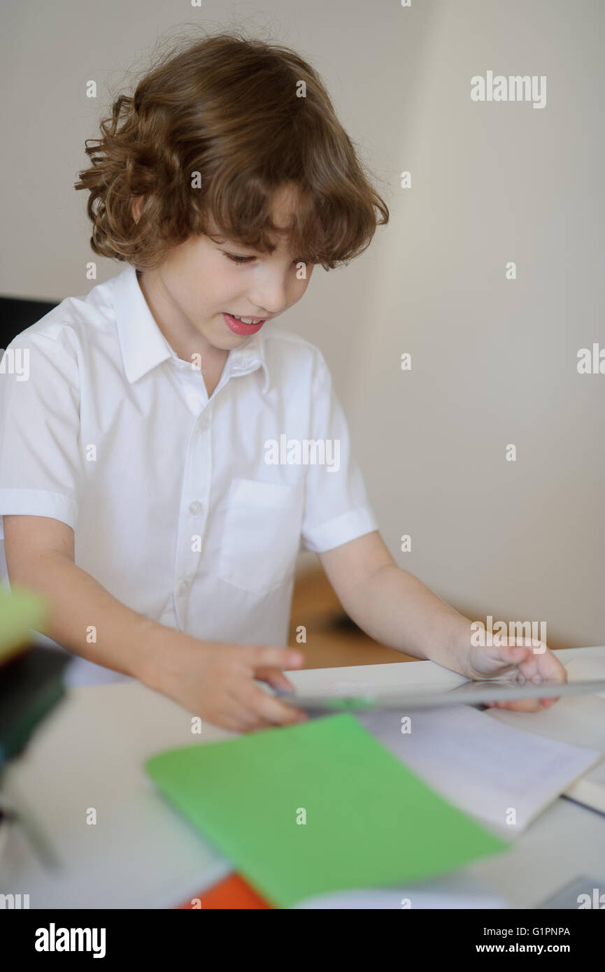 Elementary school student does his homework Stock Photo - Alamy