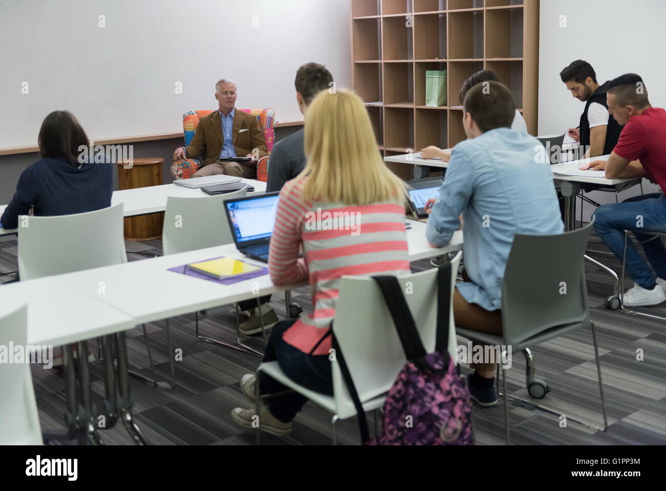 group of students study with professor in modern school classroom Stock ...