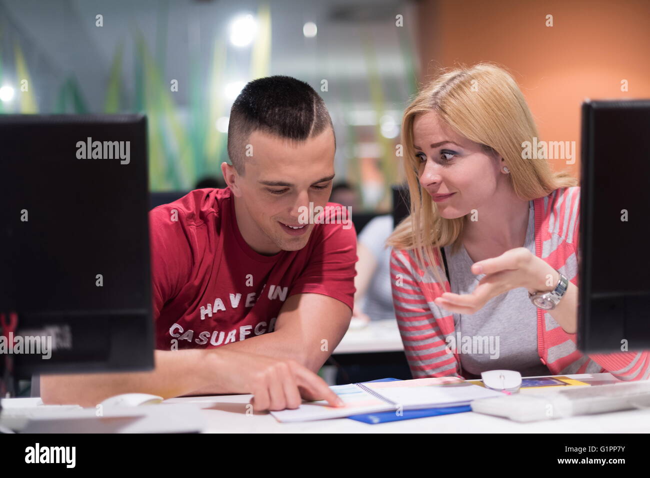 technology students group in computer lab school classroom working on ...