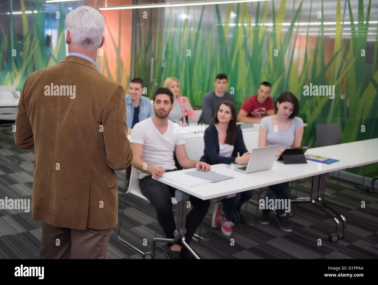 group of students study with professor in modern school classroom Stock ...