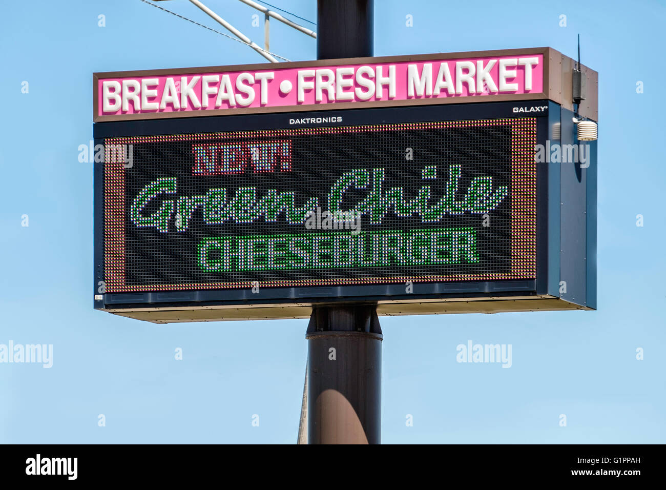 An electronic sign advertising Braum's food Stock Photo - Alamy