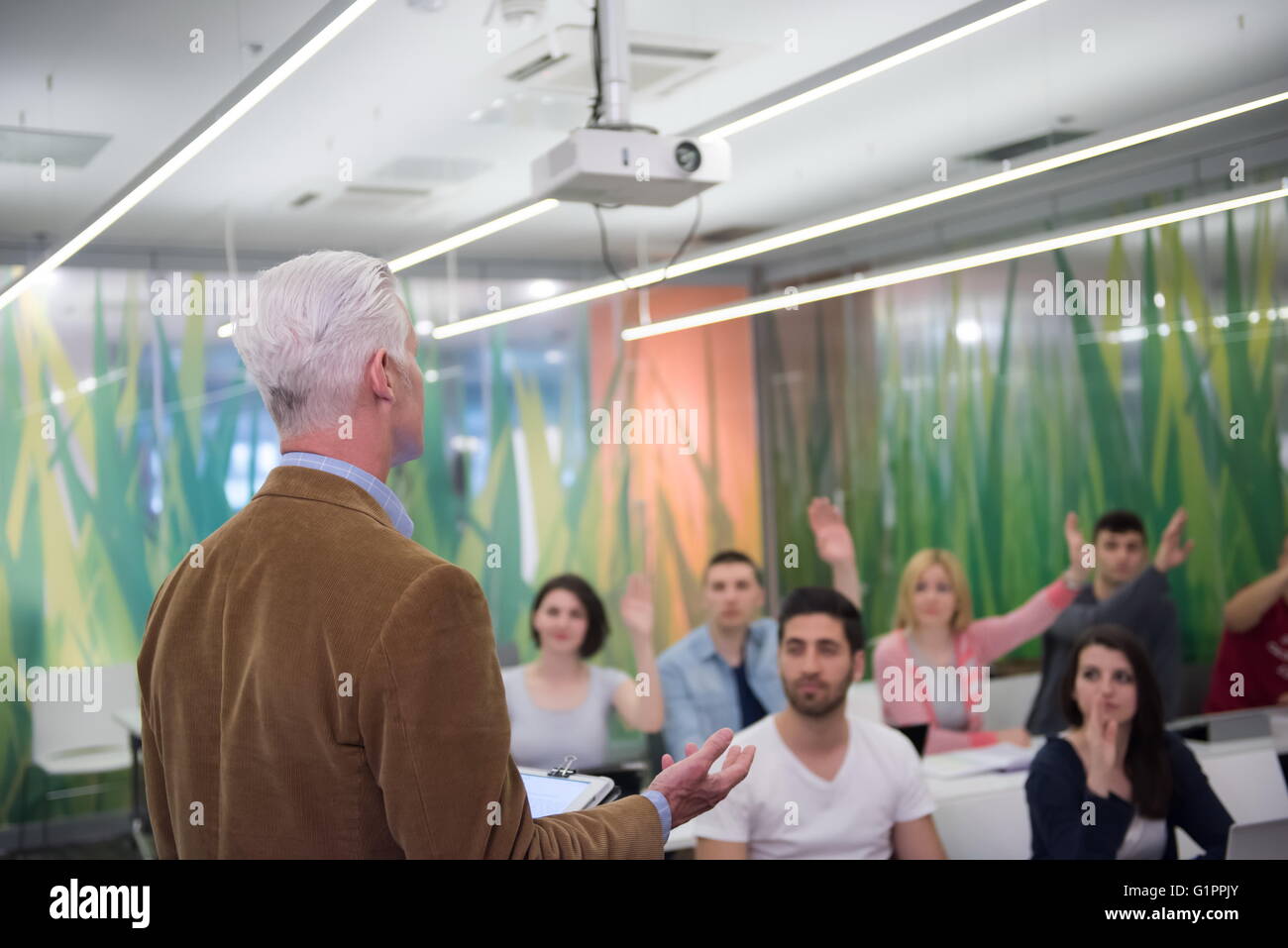group of students study with professor in modern school classroom Stock ...