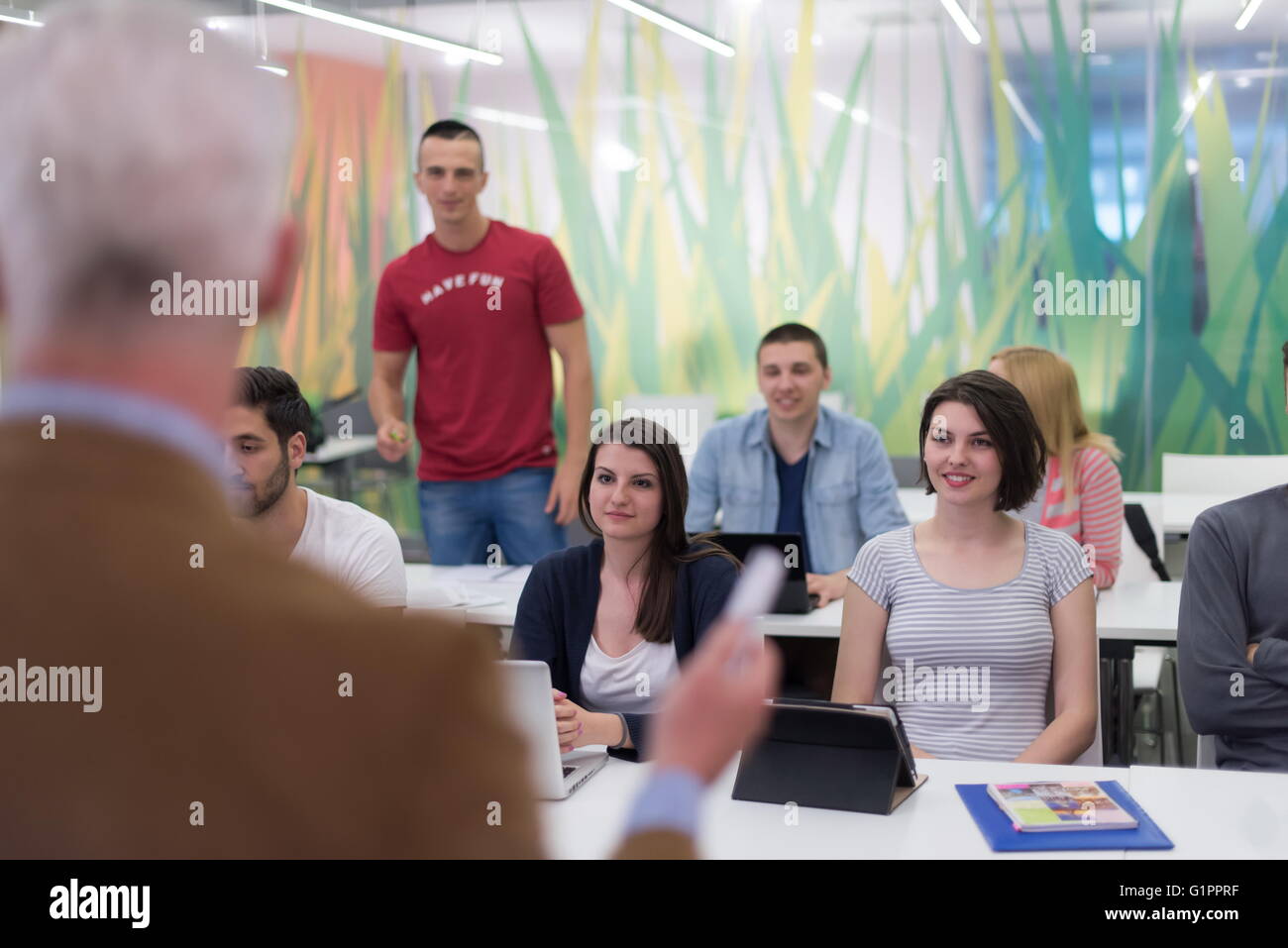 group of students study with professor in modern school classroom Stock ...