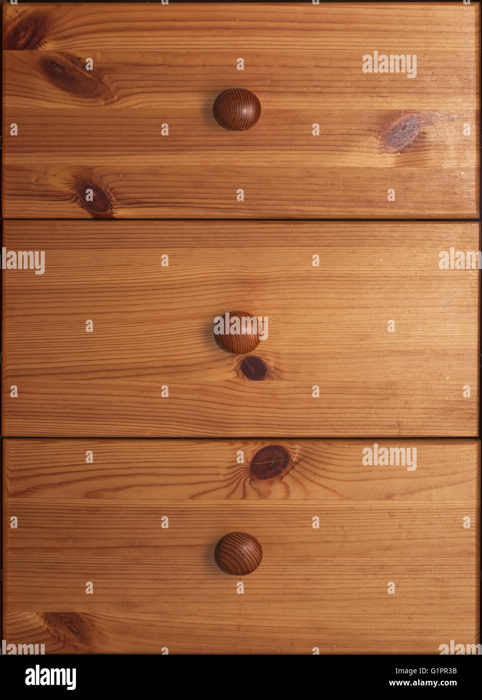 Texture of three wooden drawers seen from the front Stock Photo - Alamy
