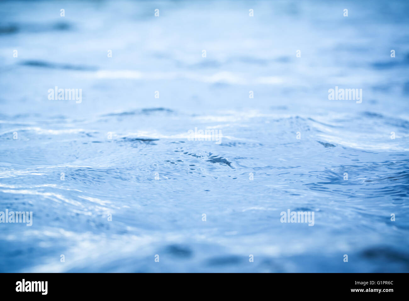 wave on the clean beautiful blue water close up, low Angle view Stock ...