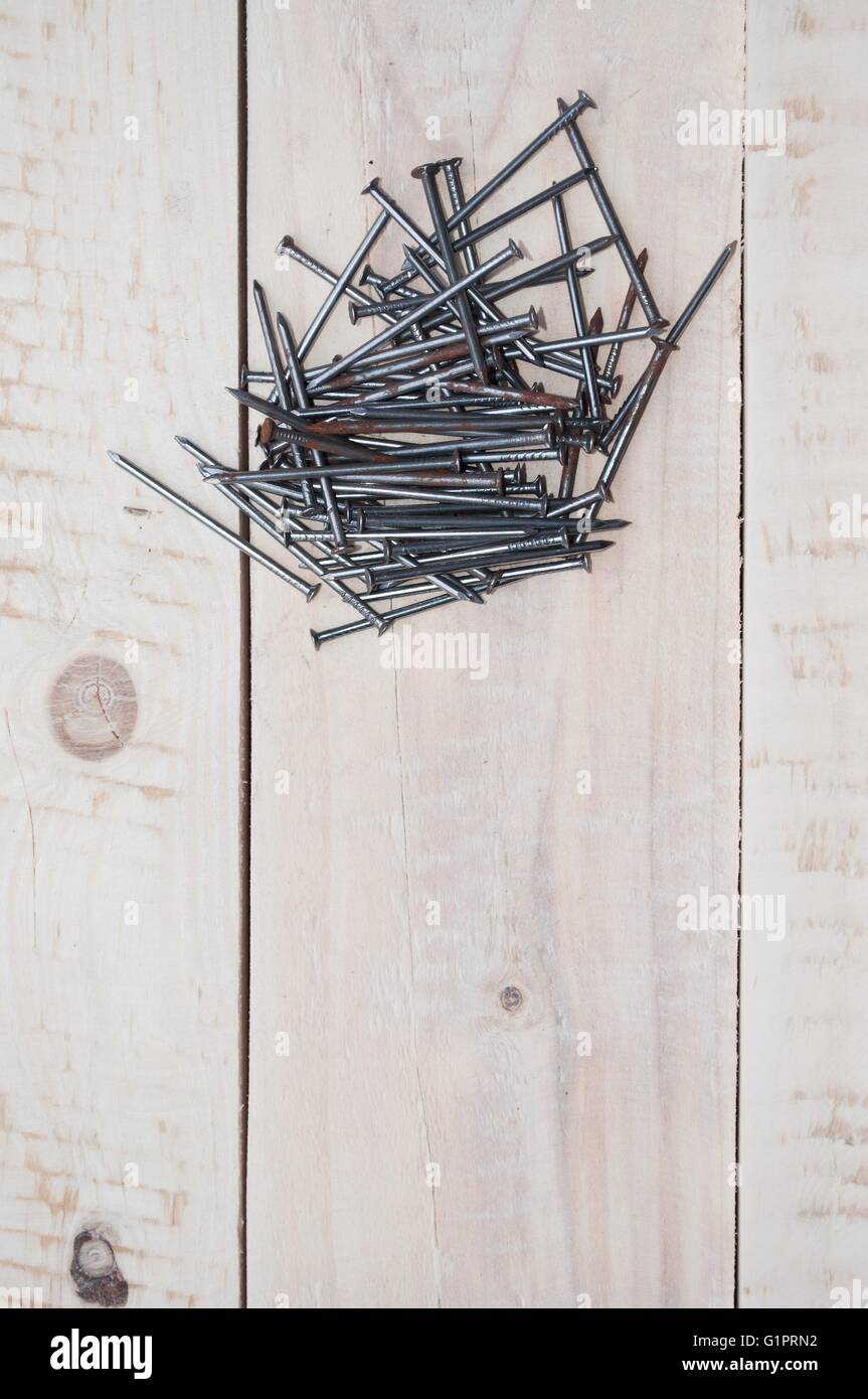 Nails on wood. Space on bottom. Carpenter background. Vertical image ...