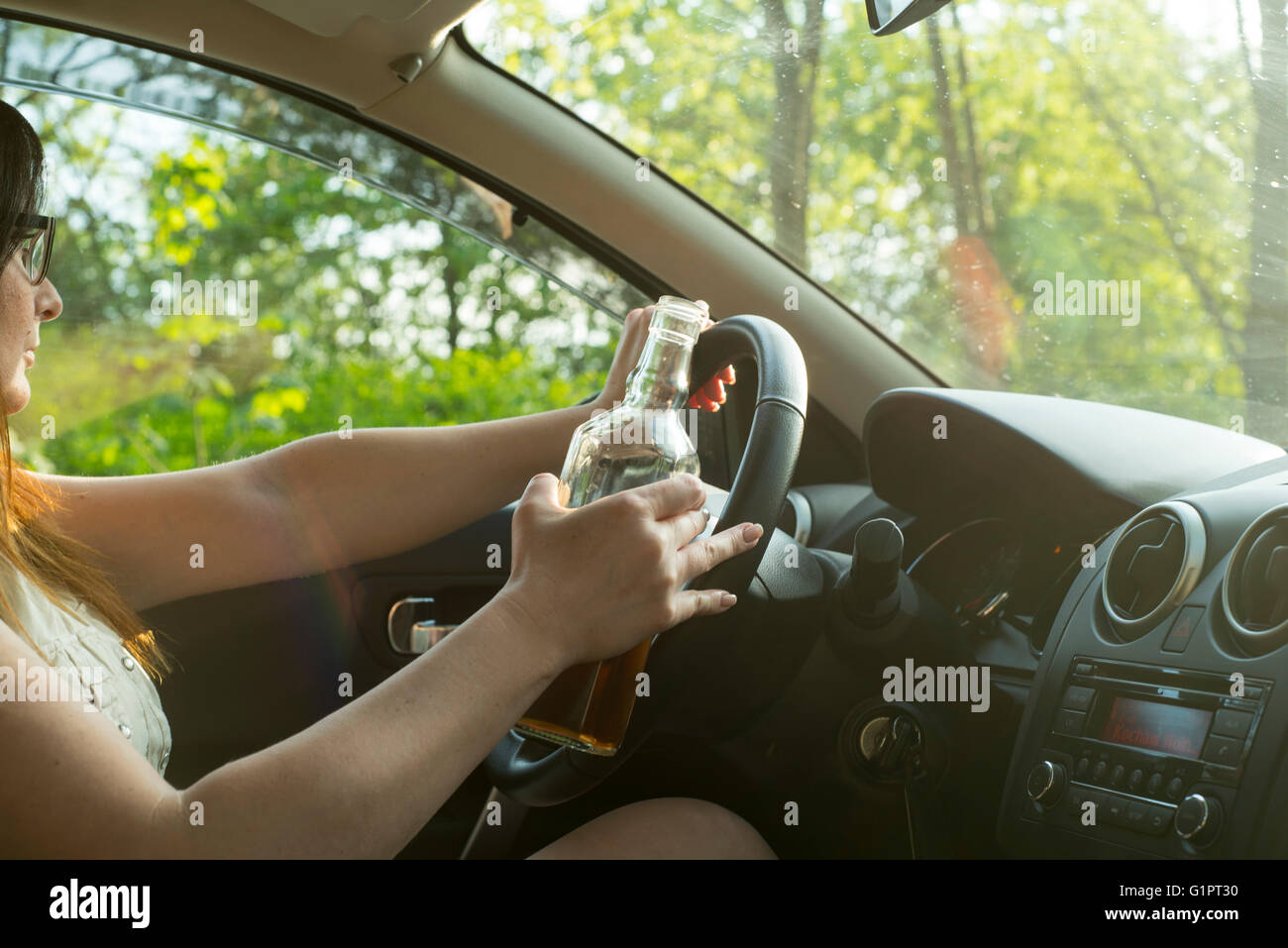 picture of woman drinking alcohol in the car Stock Photo - Alamy
