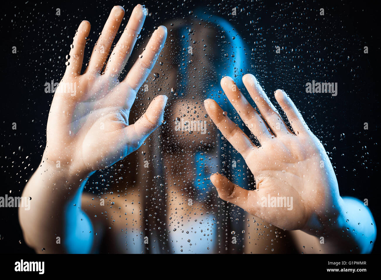 Horror woman behind glass, soft focus Stock Photo - Alamy